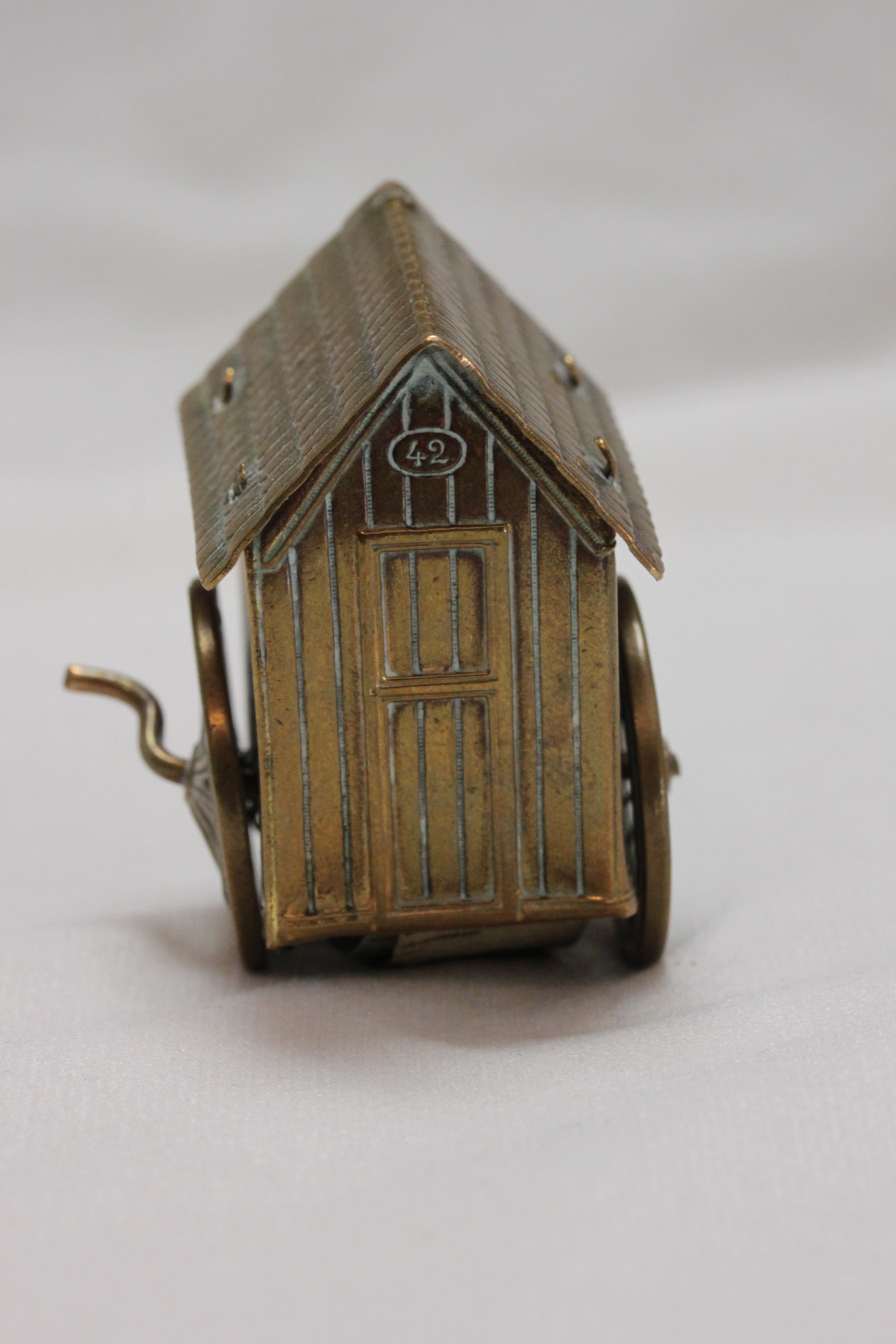 Brass novelty tape measure in the form of a Victorian bathing box ...